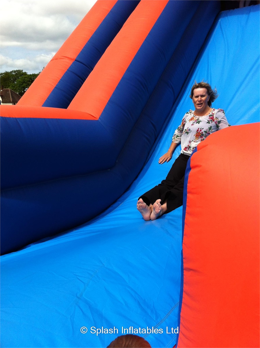 18ft Tall Multi-coloured Slide - Bouncy Castle & Event Equipment Hire ...