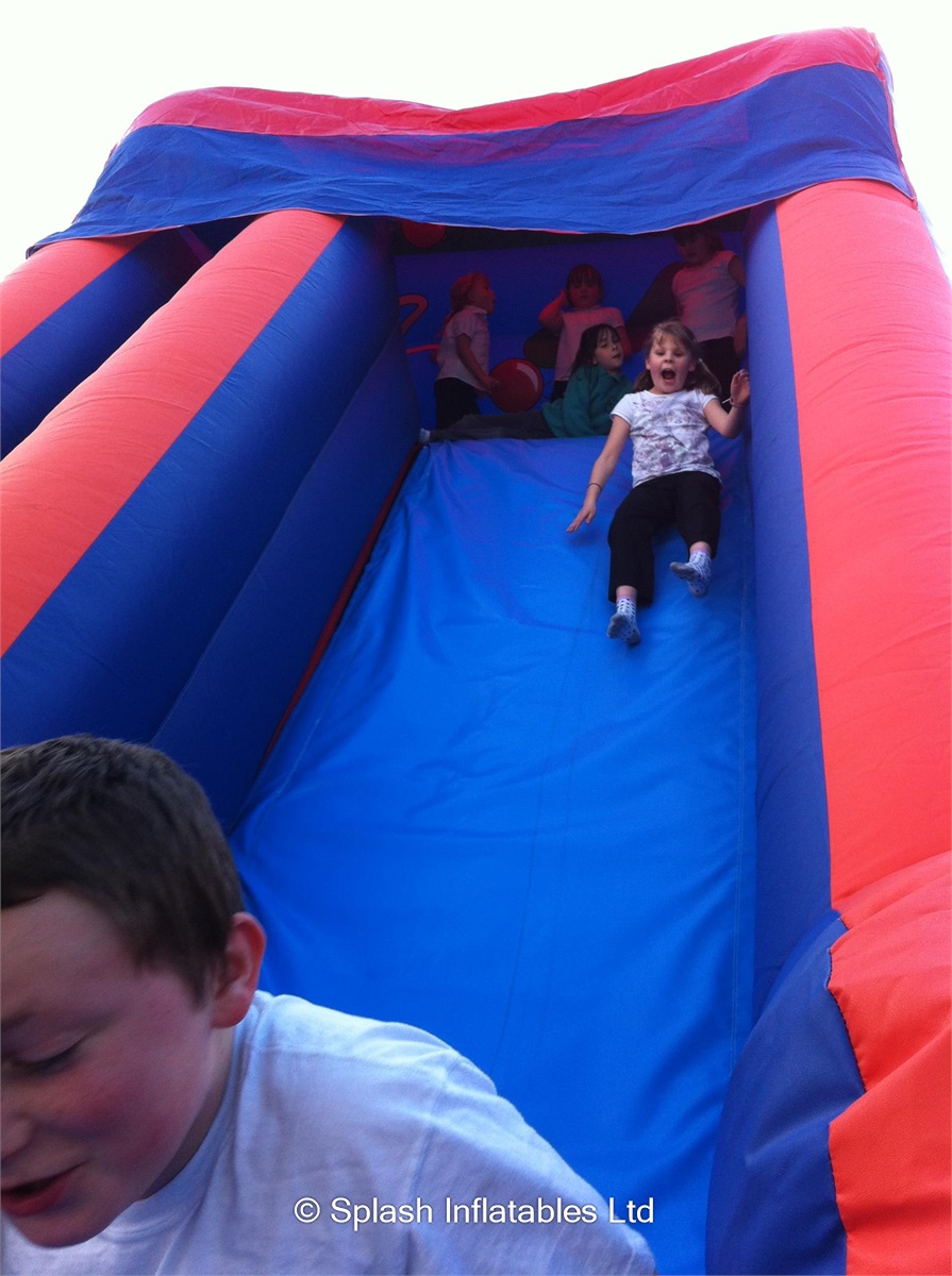 18ft Tall Multi-coloured Slide - Bouncy Castle & Event Equipment Hire ...